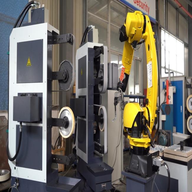Industrial robot performing deburring operation