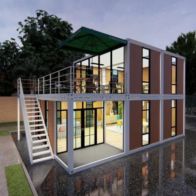 China Mini-casas Casas pequenas Casas de contêiner para escritório Showroom e restaurante no Paquistão Painel de sanduíche Casas pré-fabricadas de 20 pés à venda