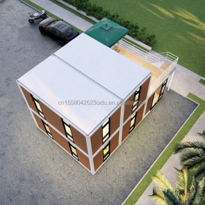China Mini-casas Casas pequenas Casas de contêiner para escritório Showroom e restaurante no Paquistão Painel de sanduíche Casas pré-fabricadas de 20 pés à venda