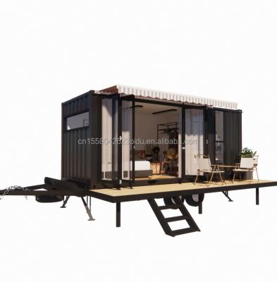 Cina Moderna Mini Mobile Tiny Trailer Container House con telaio in acciaio Galvanizzato Steel Bending e Sandwich Panel Materiale Ruote in vendita