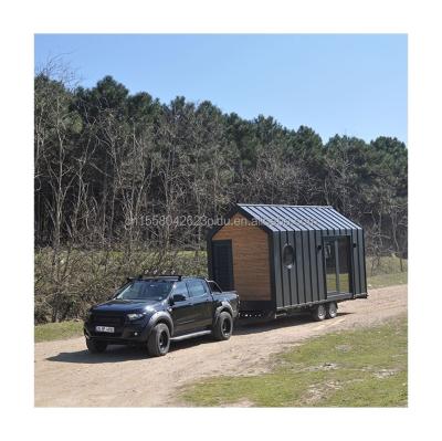 Cina Moderno design Piccola casa su ruote Materiale in acciaio Campeggio esterno Kit di costruzione giardino con pannello sandwich ondulato 50/75/100mm in vendita
