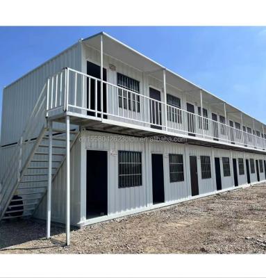 China Quick Assembly Portable Flat Pack Container House for Modern Office Beach House and Construction Engineering Camps for sale