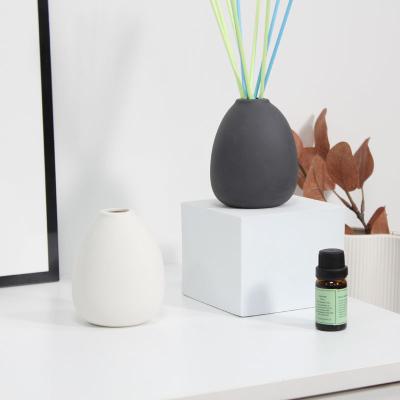 Cina Wholesale Luxury Unique 200ml Empty Perfume Diffuser Bottle White Essential Oil Diffuser Bottle in vendita
