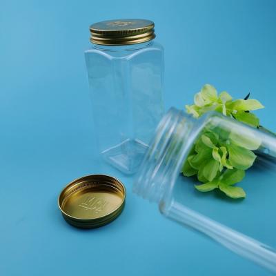 Cina barattoli di plastica del quadrato 320ml con l'imballaggio matto del biscotto di Candy dei coperchi in vendita