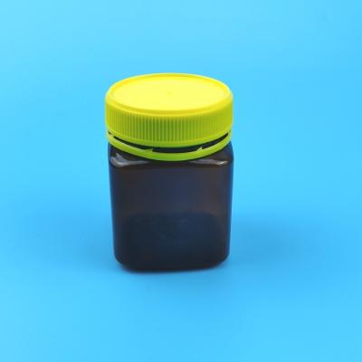 Cina Coperchio evidente di plastica vuoto di 200ml 320ml 400ml Honey Jar Square With Tamper in vendita