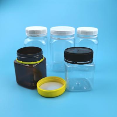 Cina Coperchio evidente di plastica vuoto di 200ml 320ml 400ml Honey Jar Square With Tamper in vendita