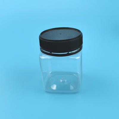 Cina Coperchio evidente di plastica vuoto di 200ml 320ml 400ml Honey Jar Square With Tamper in vendita