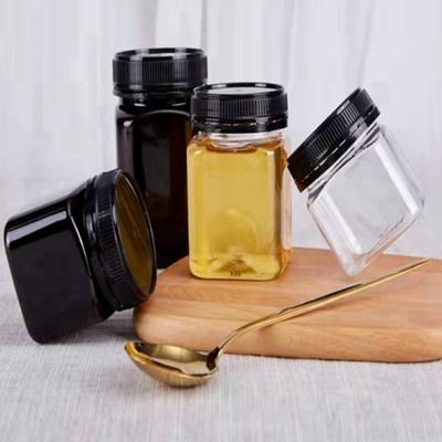 China 200ml 320ml 400ml Plastic Spice Container Amber Honey Jar for sale