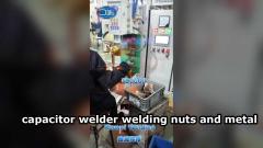 capacitor welder welding nuts and metal sheet