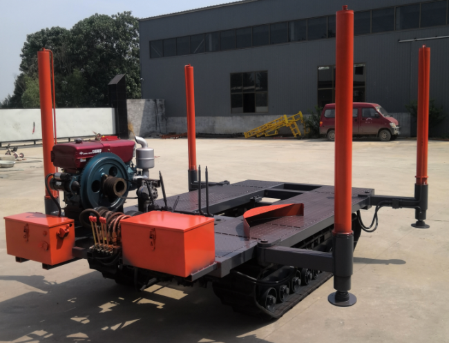 Close-up of rubber track mechanism