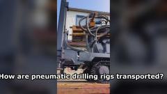 How are pneumatic drilling rigs transported?