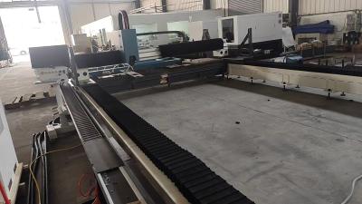 Cina Sistema automatizzato ad alta precisione Gantry Laser Cutting Machine con raffreddamento ad acqua Accuratezza di posizionamento ± 0,03 mm in vendita