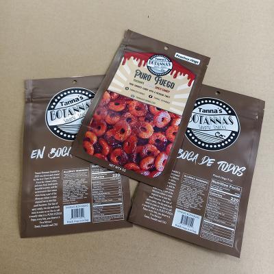 China Bolsas para embalaje de alimentos resistentes a la humedad con diseño de sellado reutilizable e impresión personalizable. en venta