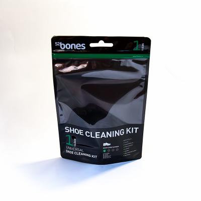 Sacchetti stand-up premium con finestra trasparente per l'imballaggio di kit per la pulizia delle scarpe con superficie lucida personalizzata ed economicamente vantaggiosi.
