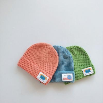 China Acrylic Cashmere Wool Waffle Beanie In Winter With Custom Knitted Patch And RPET Label for sale