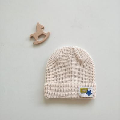 China Acrylic Cashmere Wool Waffle Beanie In Winter With Custom Knitted Patch And RPET Label for sale