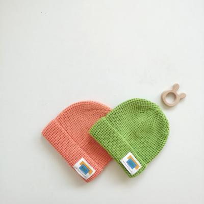 China Acrylic Cashmere Wool Waffle Beanie In Winter With Custom Knitted Patch And RPET Label for sale