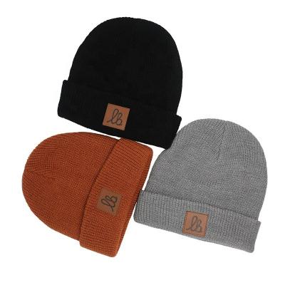 China Classic Ribbed Cuffed Gorras Casquette Toques Skull Beanie Hats With ODM Designs for sale