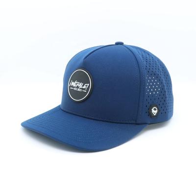 Cina Unisex Custom Navy Blue Baseball Cap con PVC Rubber Patch Logo e Waterproof Design in vendita