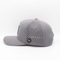 China Custom 5 Panel Laser Cut Hole Snapback Hat Waterproof Rubber Cap 56-60cm Adult Size for sale
