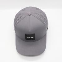 China Custom 5 Panel Laser Cut Hole Snapback Hat Waterproof Rubber Cap 56-60cm Adult Size for sale