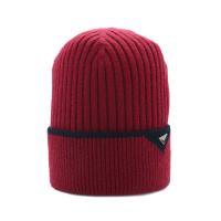 China Custom Knitted Winter Beanie Hat with Pom Pom 100% Acrylic One Size for sale