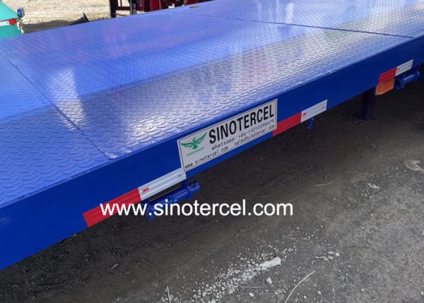 Quality CCC Flat Bed Semi Trailer 60t Heavy Duty Semi Trailer With Hydraulic Ramp for sale