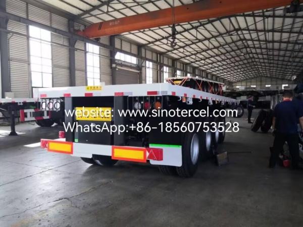 Quality 4 Axles 40ft Fuwa Axles Flat Bed Semi Trailer Strong Bearing Stable for sale