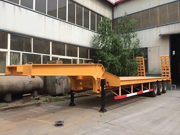 Quality 80000kg Semi Trailer Transport Yellow Semi Lowbed Trailer for sale
