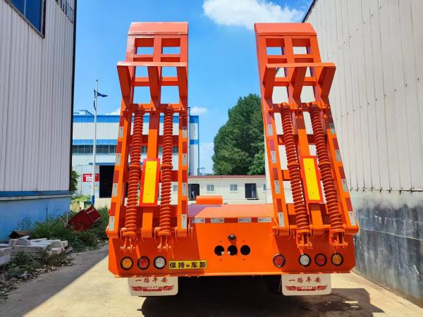 Quality Orange 3-Axle Lowboy Semi-Trailer: 60T Payload, Sturdy Design for Heavy Loads for sale