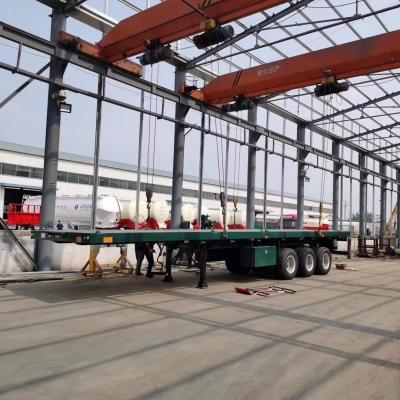 China 12R225 Tire Flat Bed Semi Trailer Built for Stability and Durability in Heavy Load Transport Featuring 35in JOST King Pin for sale