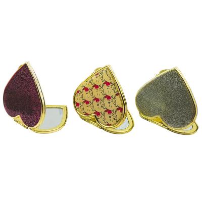 China Custom Paint Color Lighted Makeup Mirror Pocket Heart Shaped Mirror for sale