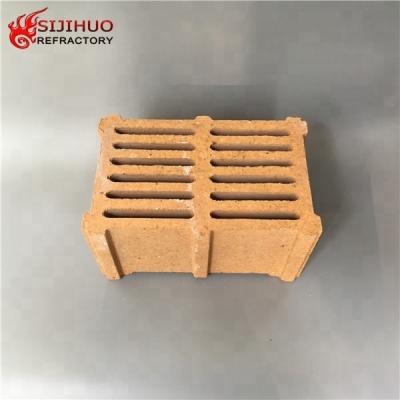 China SiC Content of 1.2-1.4% 230x114x65mm Lattice Refractory Brick for Industrial Furnaces for sale
