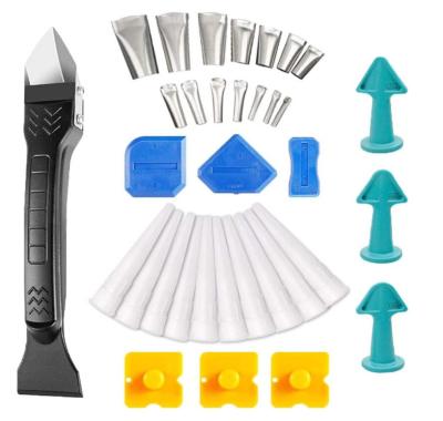 Cina 34PCS strumento di finitura di calcificazione utensile riutilizzabile in acciaio inossidabile e silicone applicatore ugello di sigillante scraper calciatore in vendita