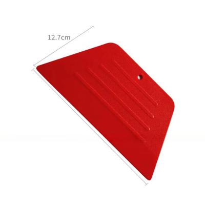 China papel de parede de plástico vermelho grande raspador especial para papel de parede vermelho espessamento e ferramenta trapezoidal à venda