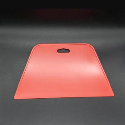 Cina carta da parati di plastica rossa speciale grande raschietto per carta da parati di spessimento rosso e strumento trapezoide in vendita