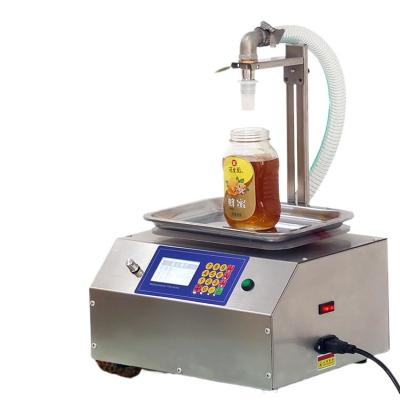 China Accurate Liquid Filling Machine for Honey Sesame Paste Edible Oil Glue Viscous Liquid for sale