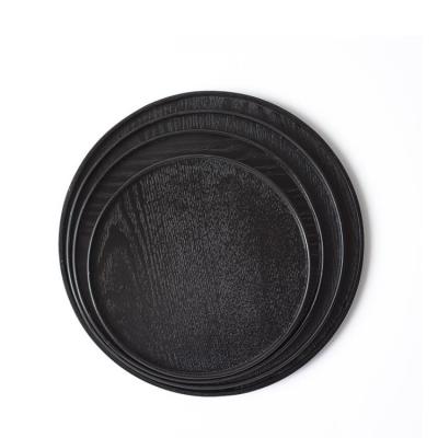 China Hot sale hotel restaurant round black wooden plate tray cheap black wood serving tray for sale