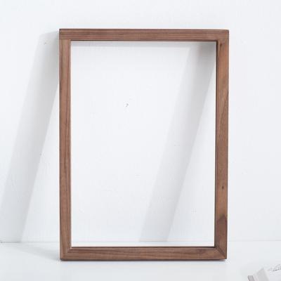 China Customize creative wall mount artwork black walnut photo frame wood picture photo poster frame for sale