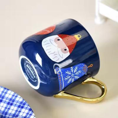 China Ins High value Blue Ceramic mug Creative Electric gold-plated handle Water mug Santa Claus mug for sale