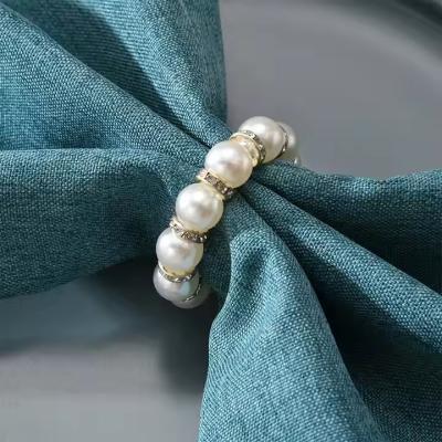 China Wedding home party decor modern napkin holder handmade luxury beaded decorative table pearl napkin rings for sale