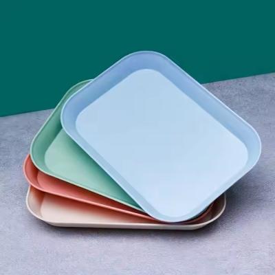 China Wheat straw tableware dishes PP unbreakable dinner plates solid color plastic serving rolling trays for sale