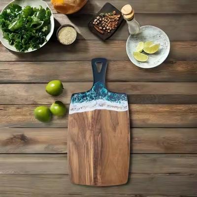 China Luxury cheeseboard with handle coastal decor kitchenware green ocean wave epoxy resin cutting board for sale