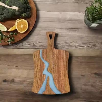 China Epoxy resin river chopping blocks fan-shaped acacia wood art epoxy resin cutting board with handle for sale