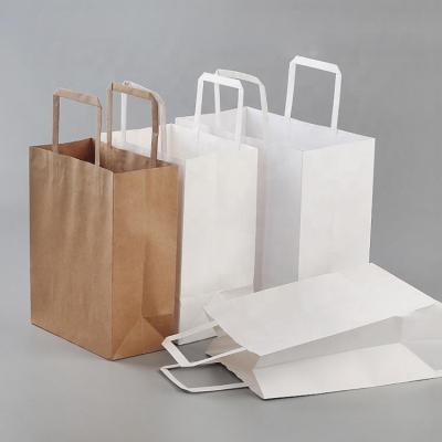 China Wholesale shopping customize printed kraft paper bag with handle for sale