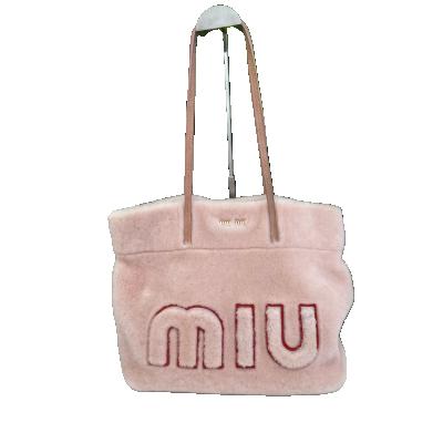 China Entrupy Second Hand Miu Miu Bag Pink Logo Detail Shearling Tote Bag For Womens for sale