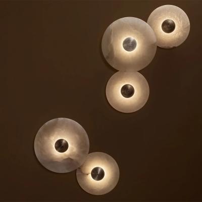 Cina Moderno design americano Median Sconce Alabastro Disco di pietra Ombra LED Lampada da parete montata Casa ufficio o camera da letto Luce in vendita