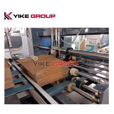 Cina YIKE GROUP One-Click Order Computer Change Automatic Folding Gluing Machine in vendita