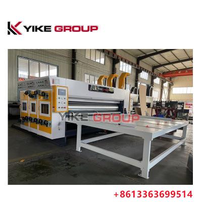 中国 YIKE GROUP 1200X2600MM チェーンフィッダー プリンター スロッター カートン ボックス 製造 機械 販売のため