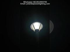 Routine polishing of outdoor lighting fixtures: Garden lights used in parks.